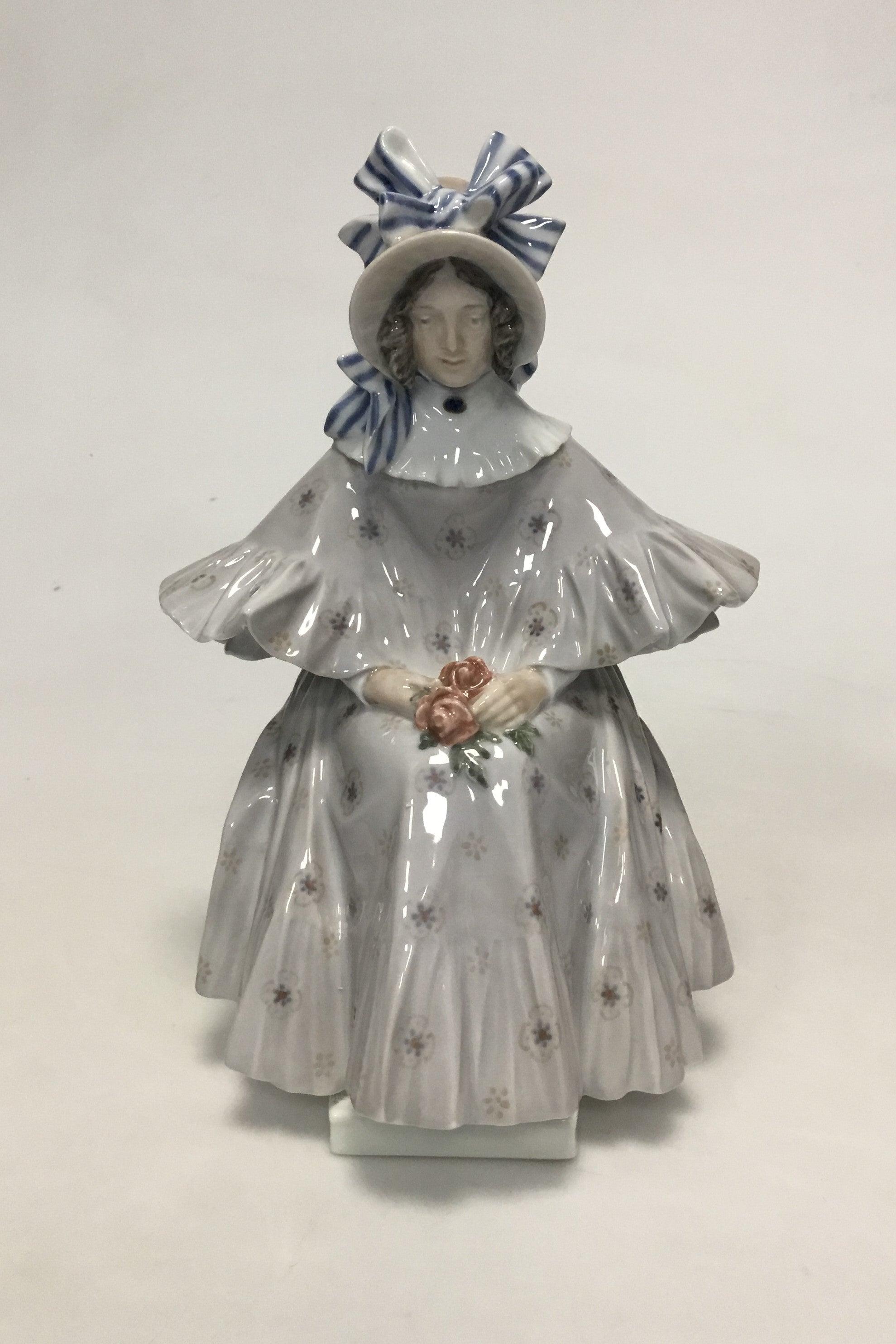 Royal Copenhagen figure of woman with roses by Christian Thomsen no 178